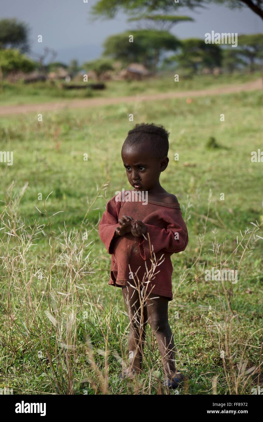 A young girl watches the the world go by Stock Photo - Alamy