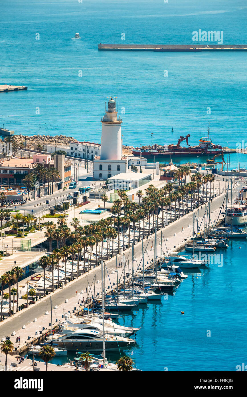 Cityscape aerial view of Malaga, Spain. Lighthouse and marina Stock ...