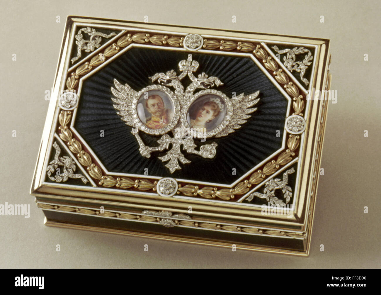 FABERGE ENAMEL BOX. /nCzar Nicholas II of Russia inset in Romanov coat ...