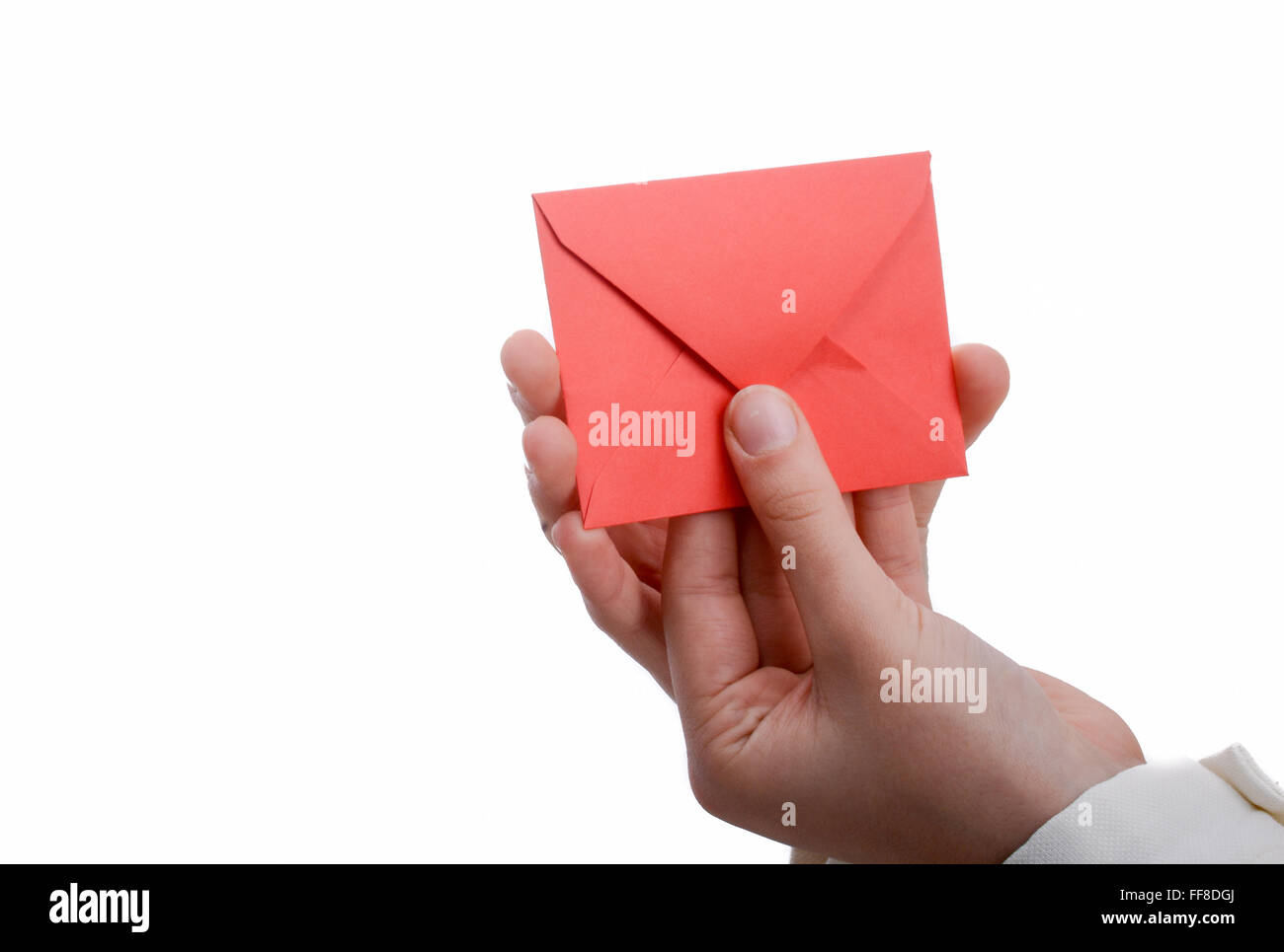 hand holding a red envelope on a white background Stock Photo - Alamy