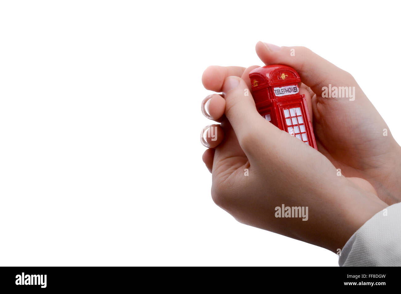 Hand holding telephone booth Stock Photo - Alamy