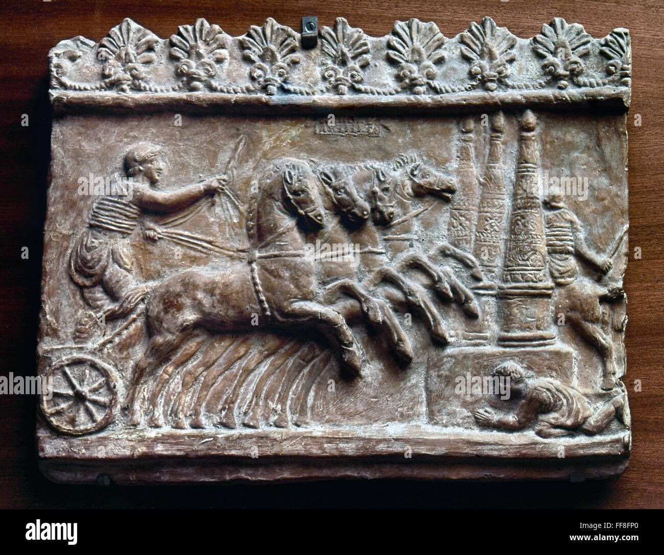 ROMAN RELIEF: CHARIOT RACE. /nFour-horse chariot (quadriga) race in the ...