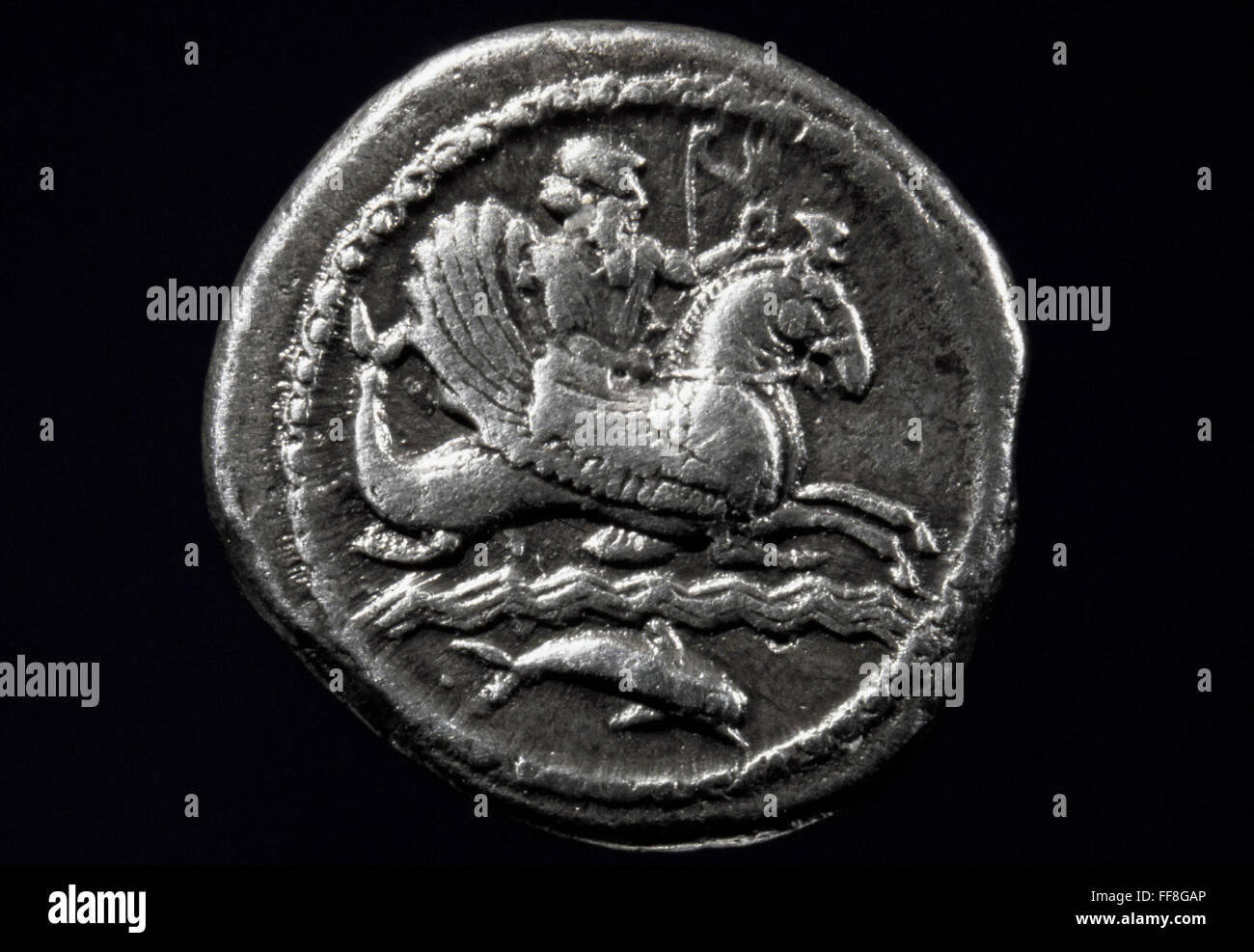 GREEK COIN, c350-300 B.C. /nArcher riding a seahorse, with dolphin ...