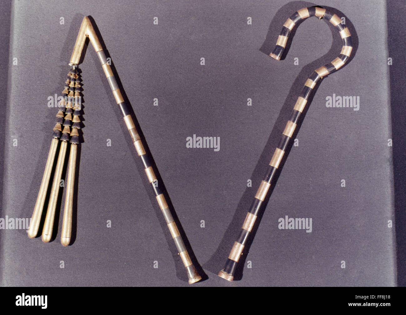 TOMB OF KING TUTANKHAMEN. /nBronze and gold crook and flail. c1342 B.C ...