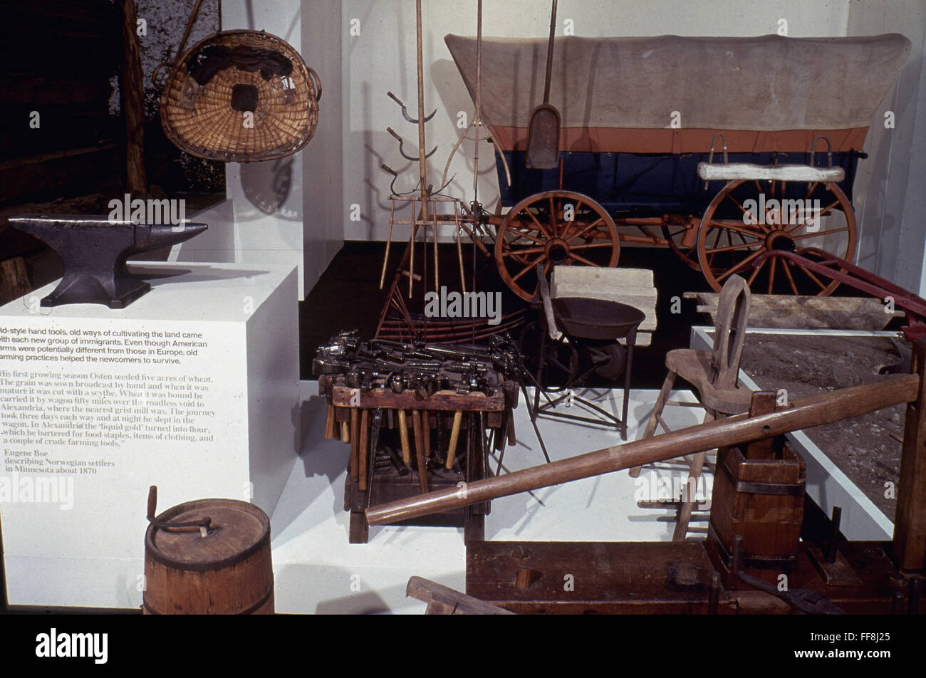 AMERICAN FARM TOOLS /nand covered wagon of the 19th century Stock Photo ...