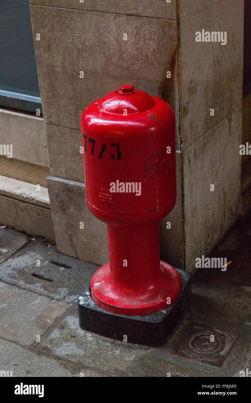 Red fire hydrant in Venice Italy Stock Photo - Alamy