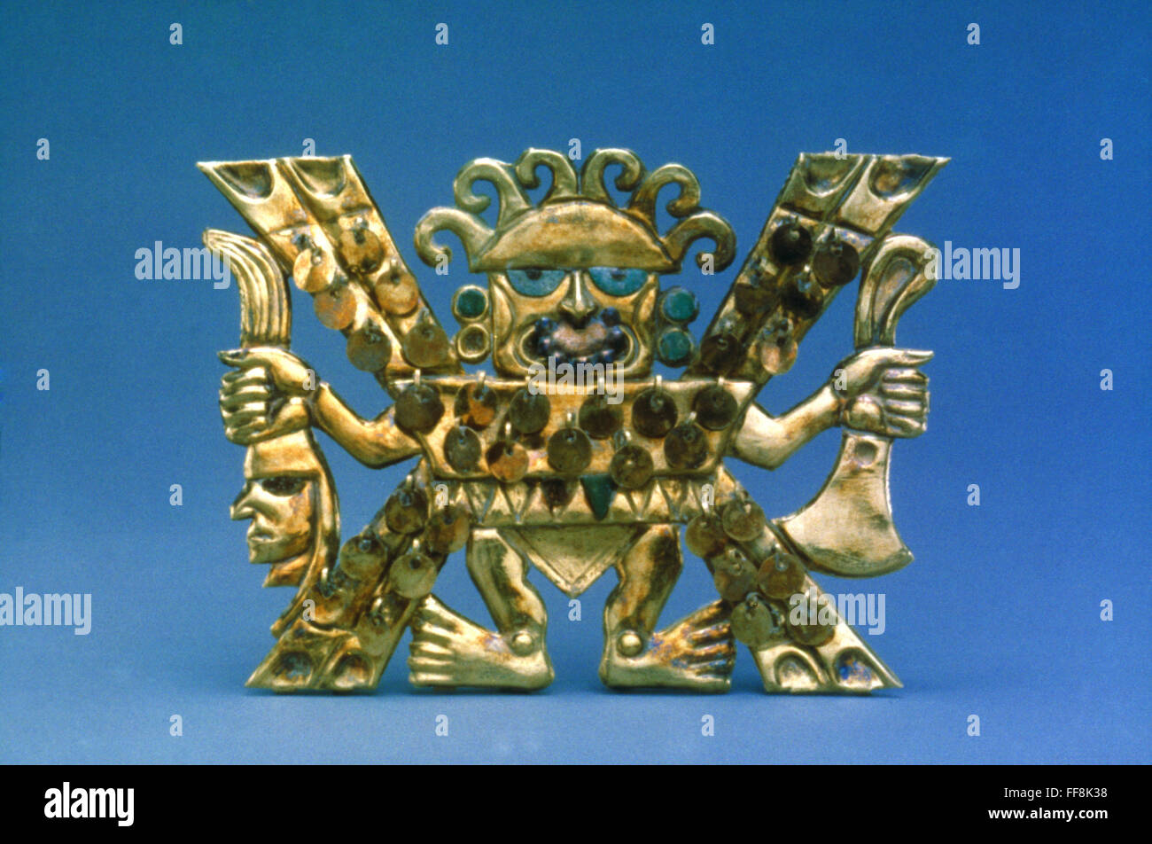 PRE-COLUMBIAN GOLD. /nPeruvian gold figure ornament with green stone ...