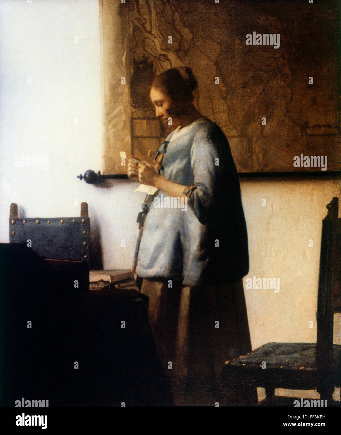 VERMEER: READING. /n'Woman in Blue Reading a Letter.' Oil on canvas by ...