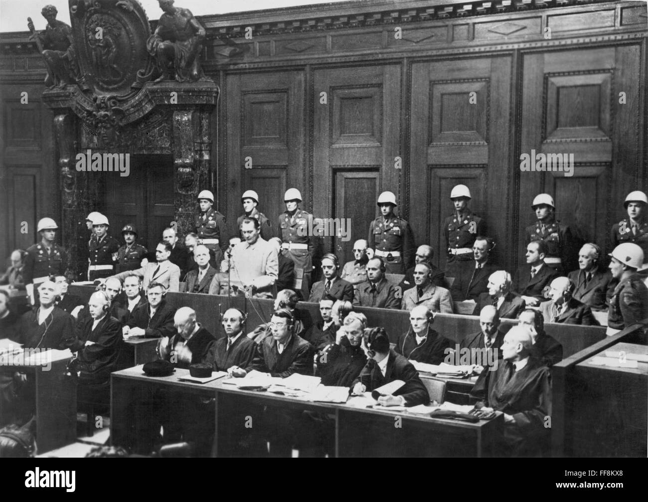 NUREMBERG TRIALS (1945-1946). /nHermann Goering, standing, with Rudolf ...