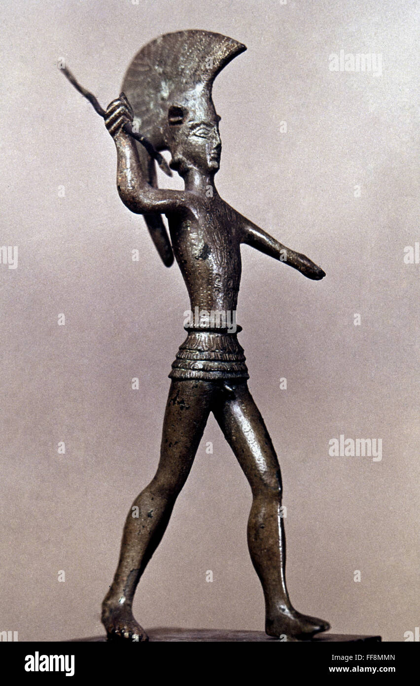 ETRUSCAN WARRIOR. /nBronze statuette of a warrior brandishing a lance ...
