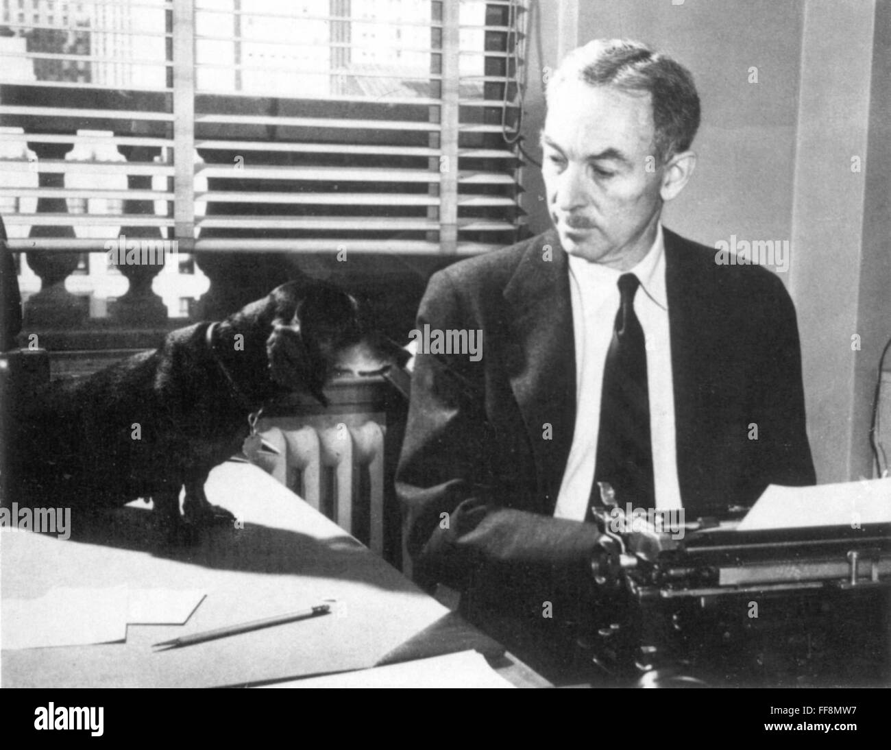 E.B. WHITE (1899-1985). /nAmerican writer. In his office at 'The New ...