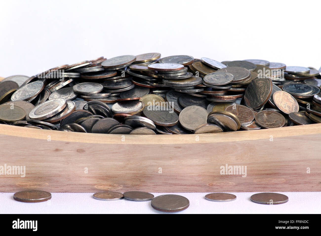 Bunch of quarters on white background Stock Photo - Alamy