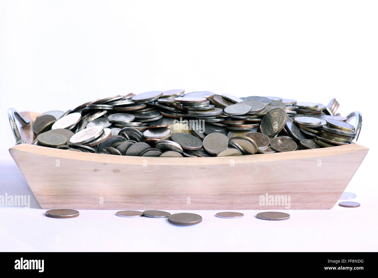 Bunch of quarters on white background Stock Photo - Alamy