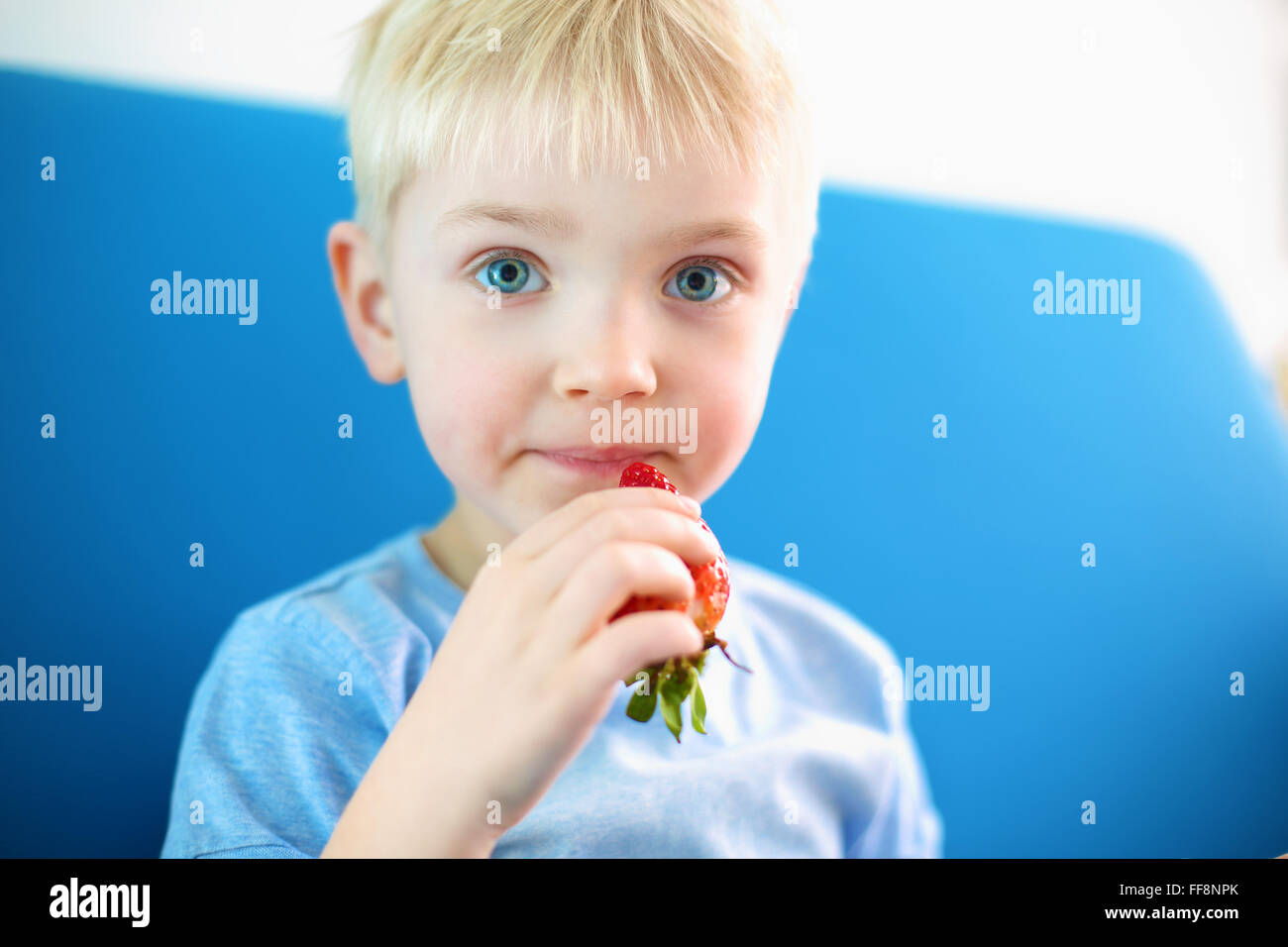 Strawberry boy, boy it strawberry fruit. Little caucasian boy ...