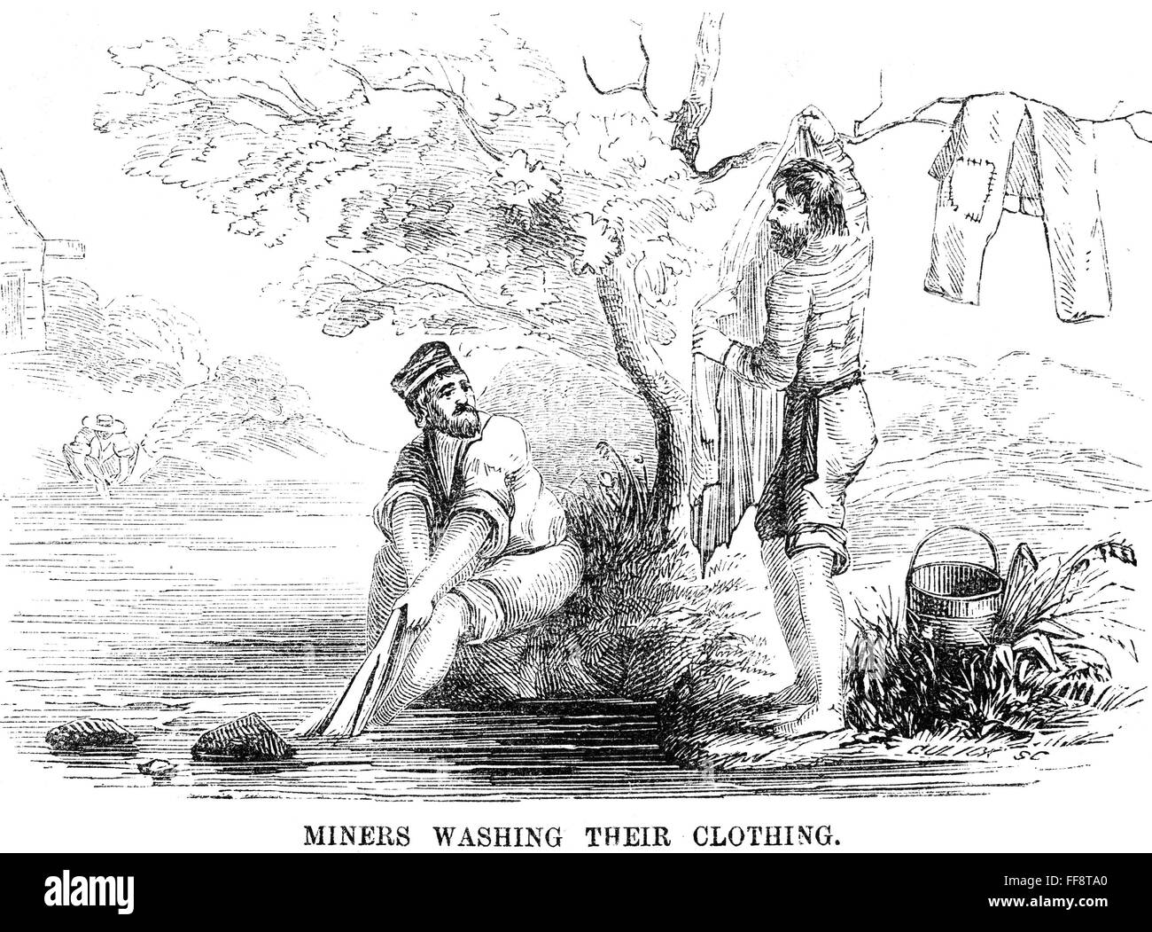 GOLD MINING CAMP, 1853. /nGold miners washing their clothes in a river ...