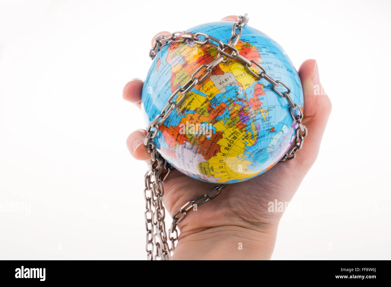 Globe in chain on a white background Stock Photo - Alamy