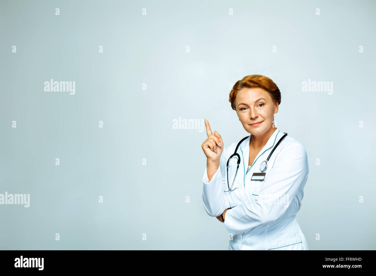 Nice professional doctor pointing hi-res stock photography and images ...