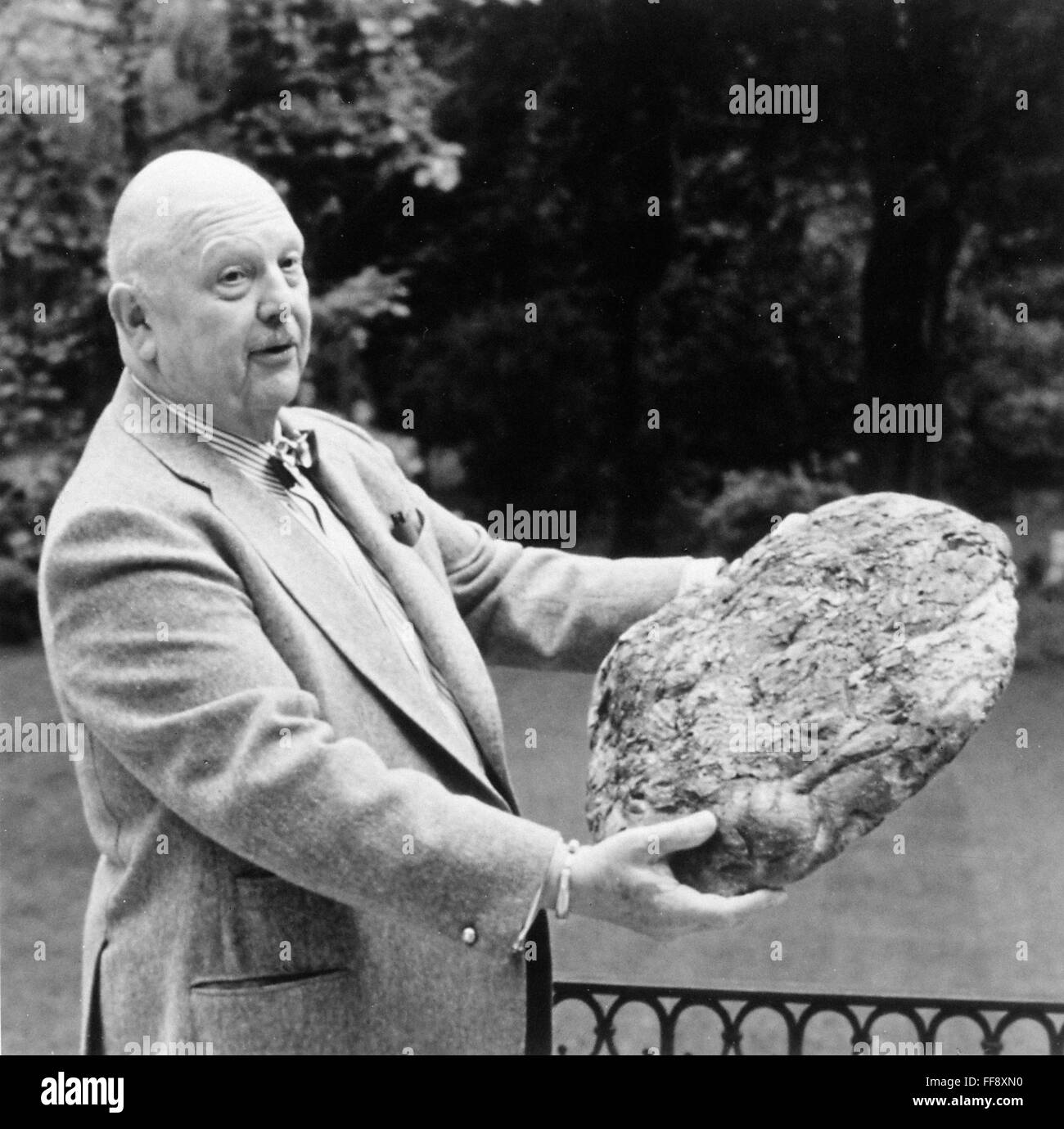 JAMES BEARD (1903-1985). /nAmerican cook and writer. Beard with a loaf ...
