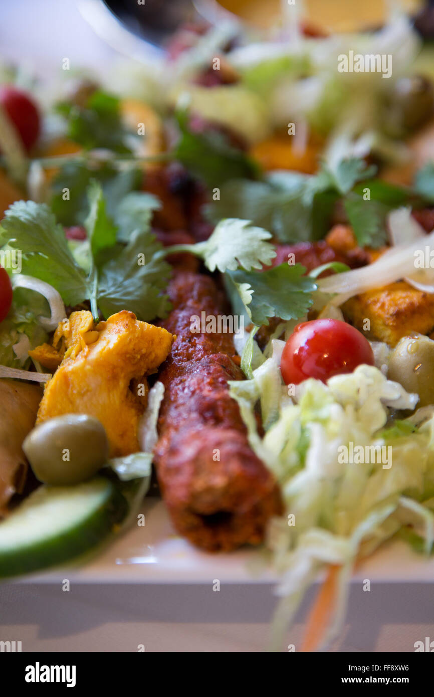 Spicy lamb starter plate at an Indian restaurant Stock Photo - Alamy