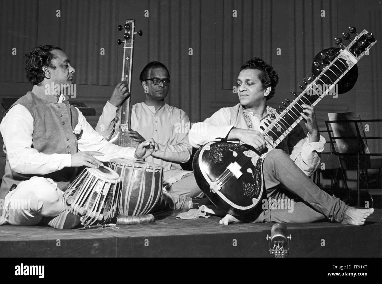 RAVI SHANKAR (1920-2012)./nIndian musician. Shankar (at right) playing ...