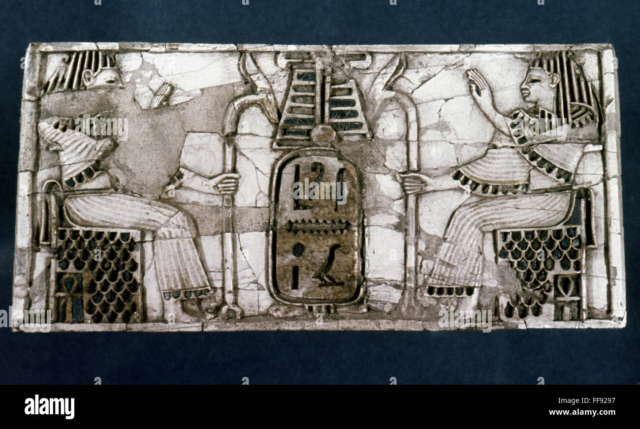 ASSYRIAN IVORY FIGURES. /nCarved ivory panel with seated figures, from ...