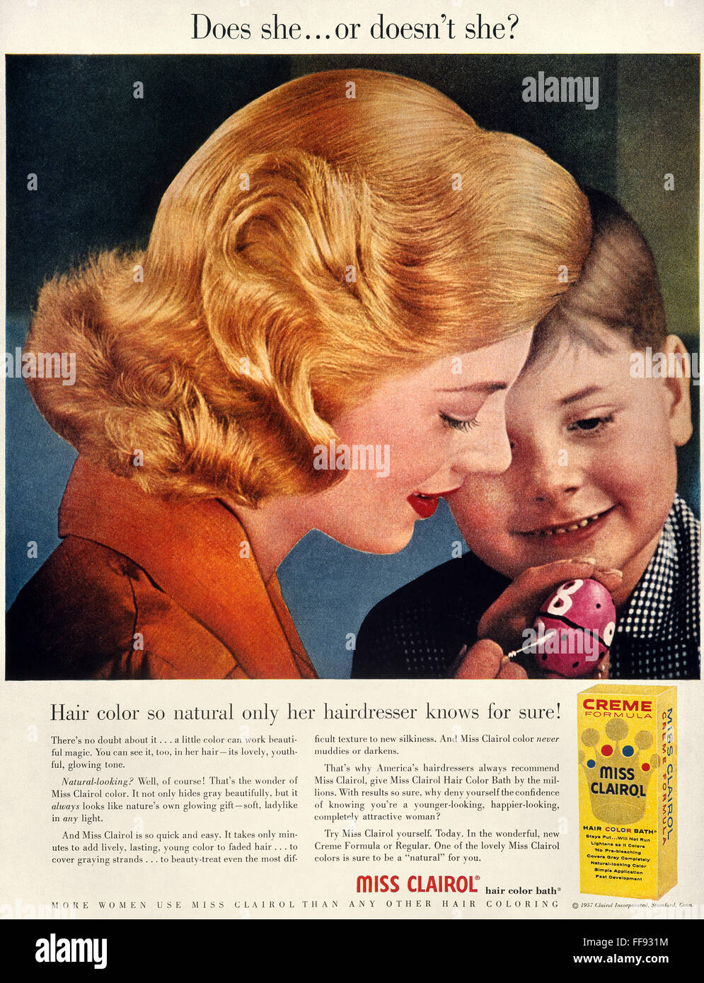 HAIR DYE AD, 1957. /n'Does she ... or doesn't she?' Advertisement for ...