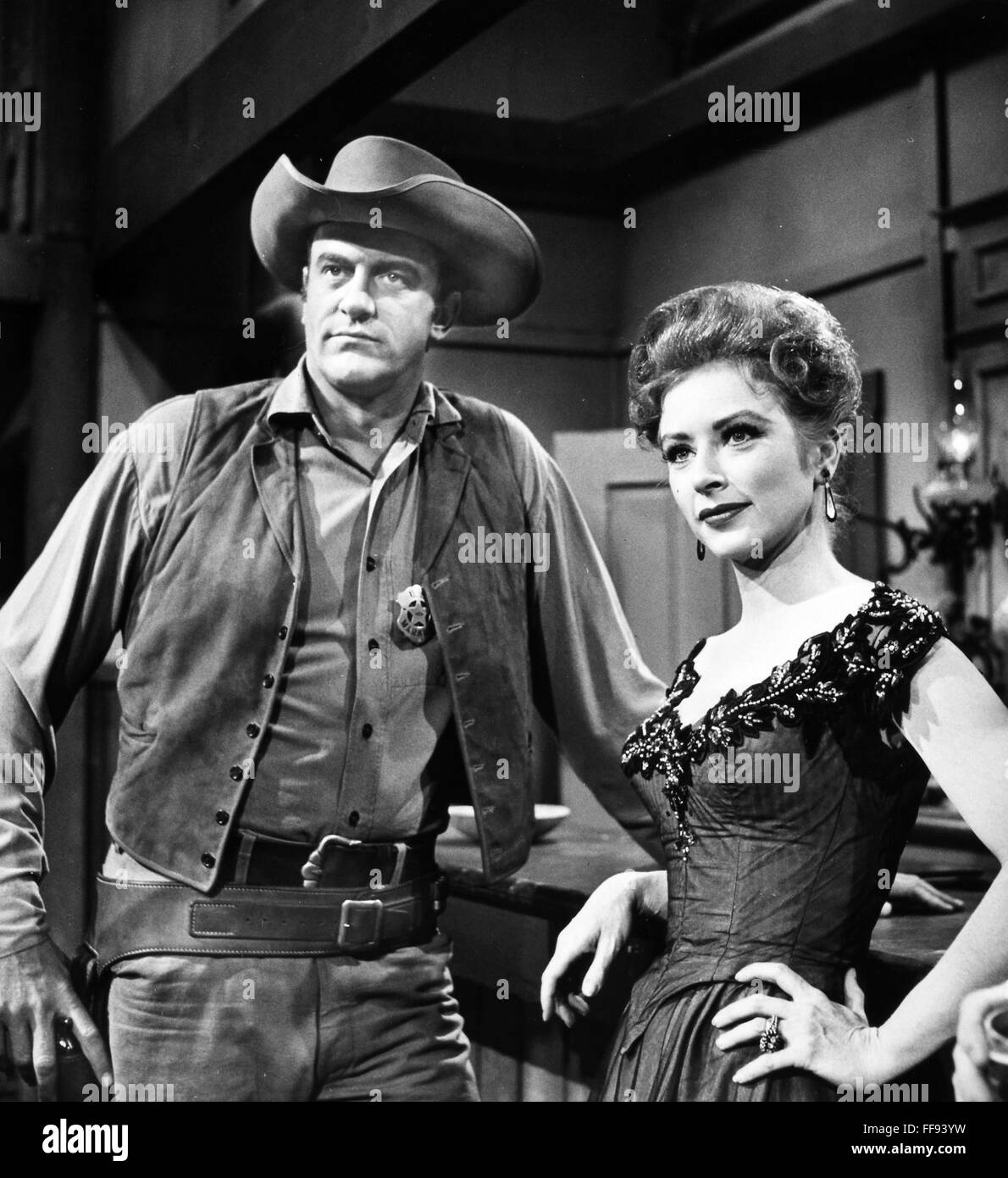 GUNSMOKE, 1960. /nJames Arness as Marshall Matt Dillon and Amanda Blake ...