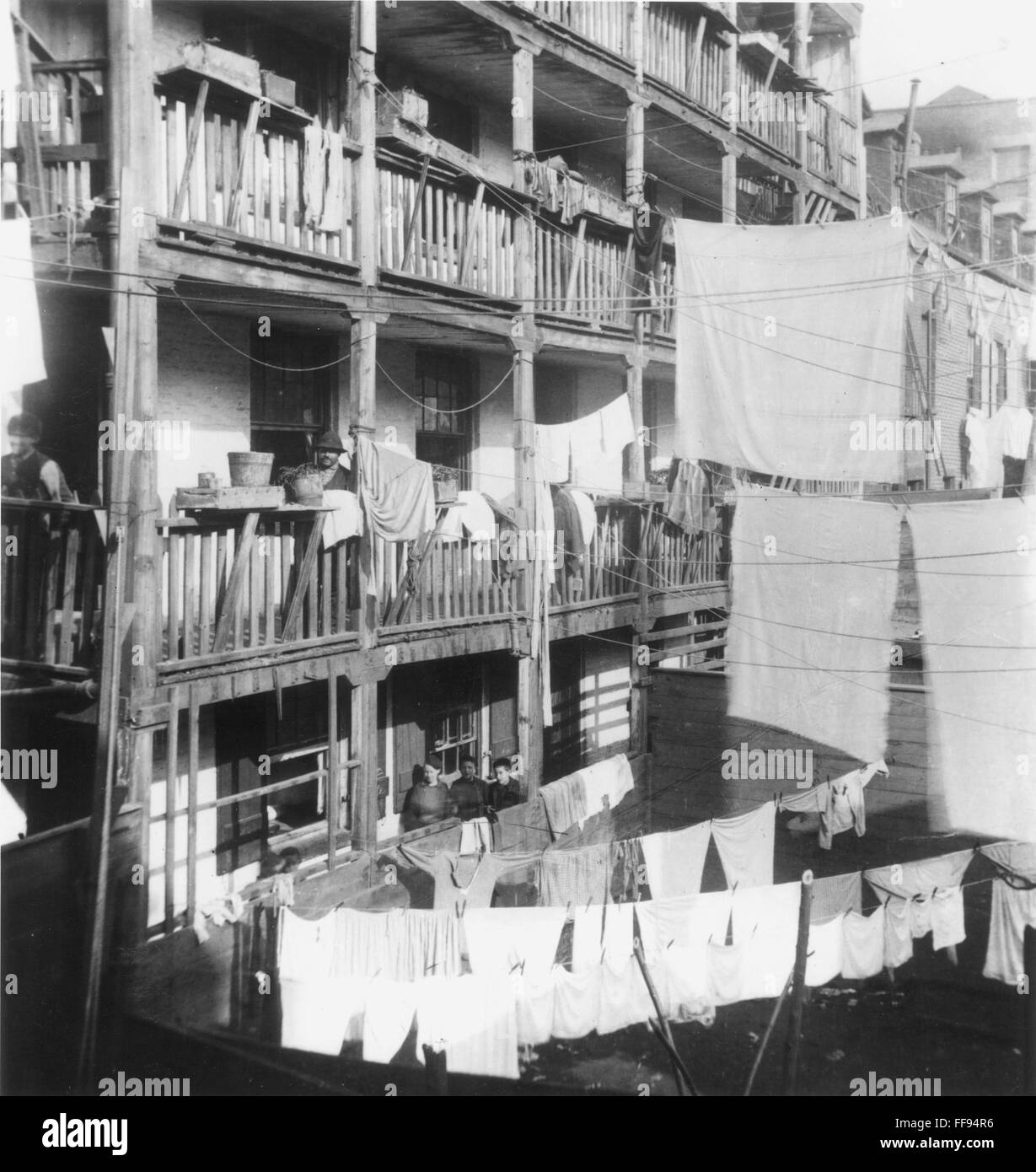 RIIS: NYC TENEMENT LIFE. /nRear tenement, Roosevelt Street. Photograph ...