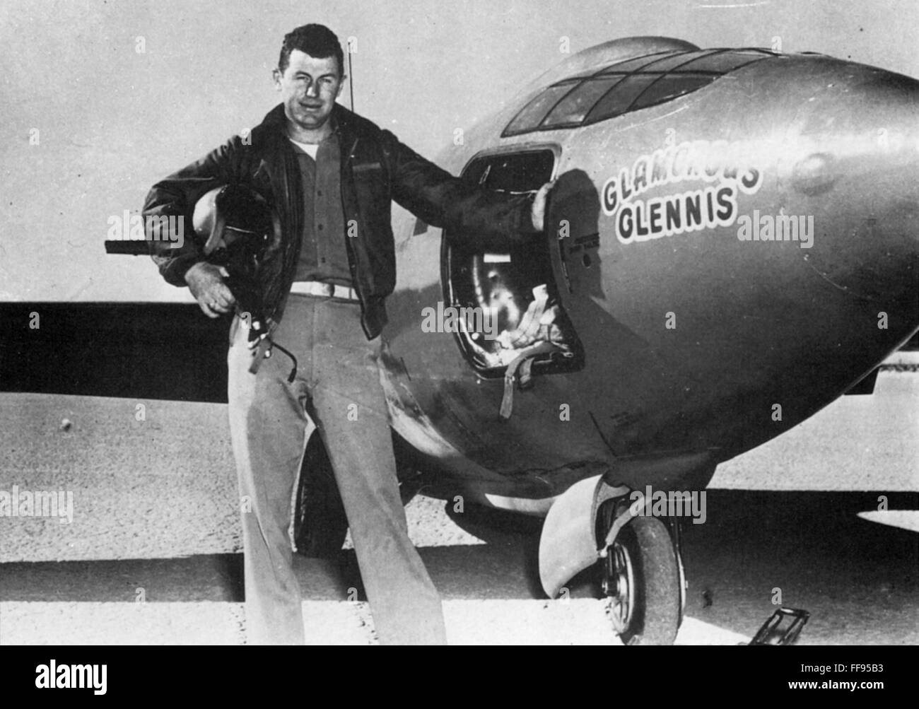 CHARLES E. YEAGER (1923- ). /nAmerican aviator. Yeager standing beside ...