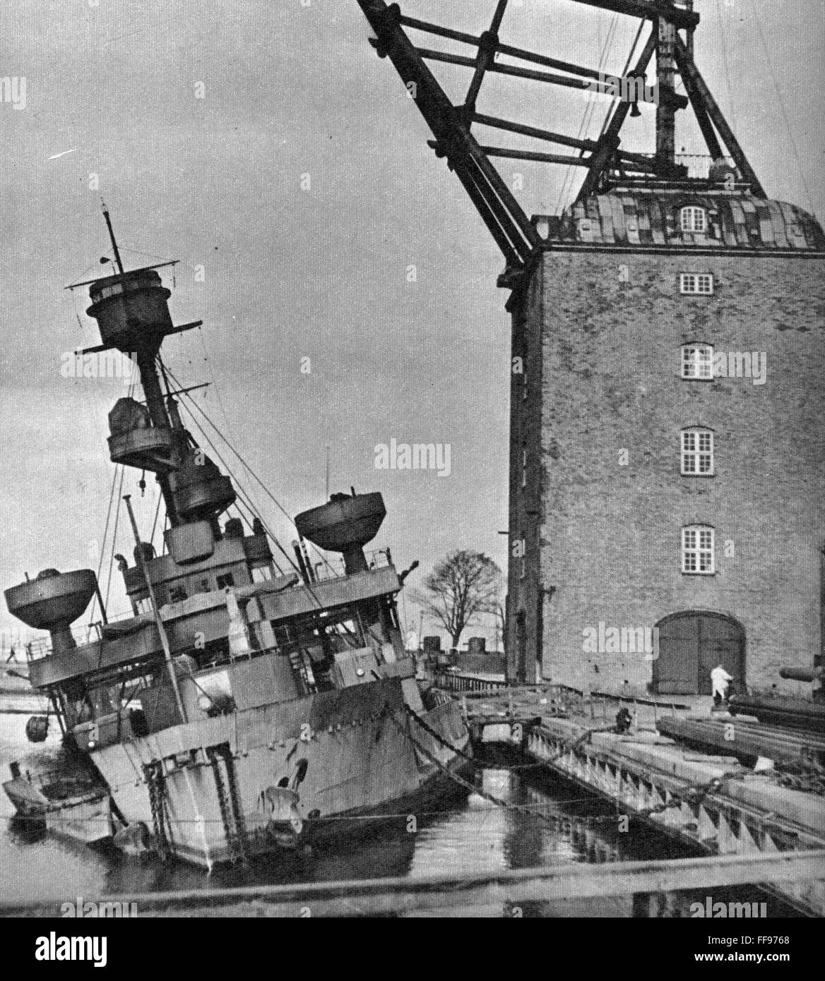 WORLD WAR II: DENMARK, 1943. /nA Danish naval vessel scuttled at Holmen ...