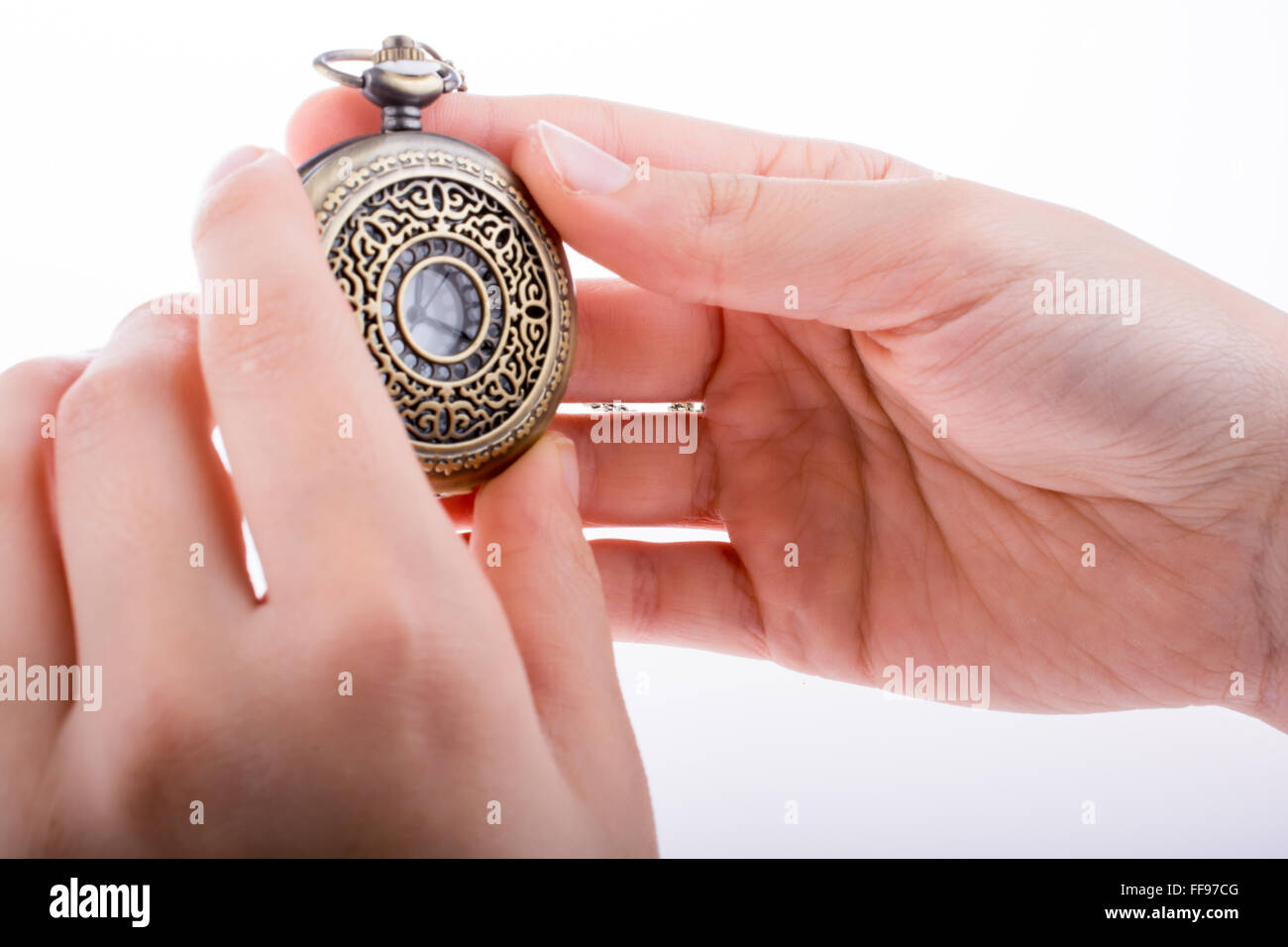 Hand holding a retro styled pocket watch in hand Stock Photo - Alamy
