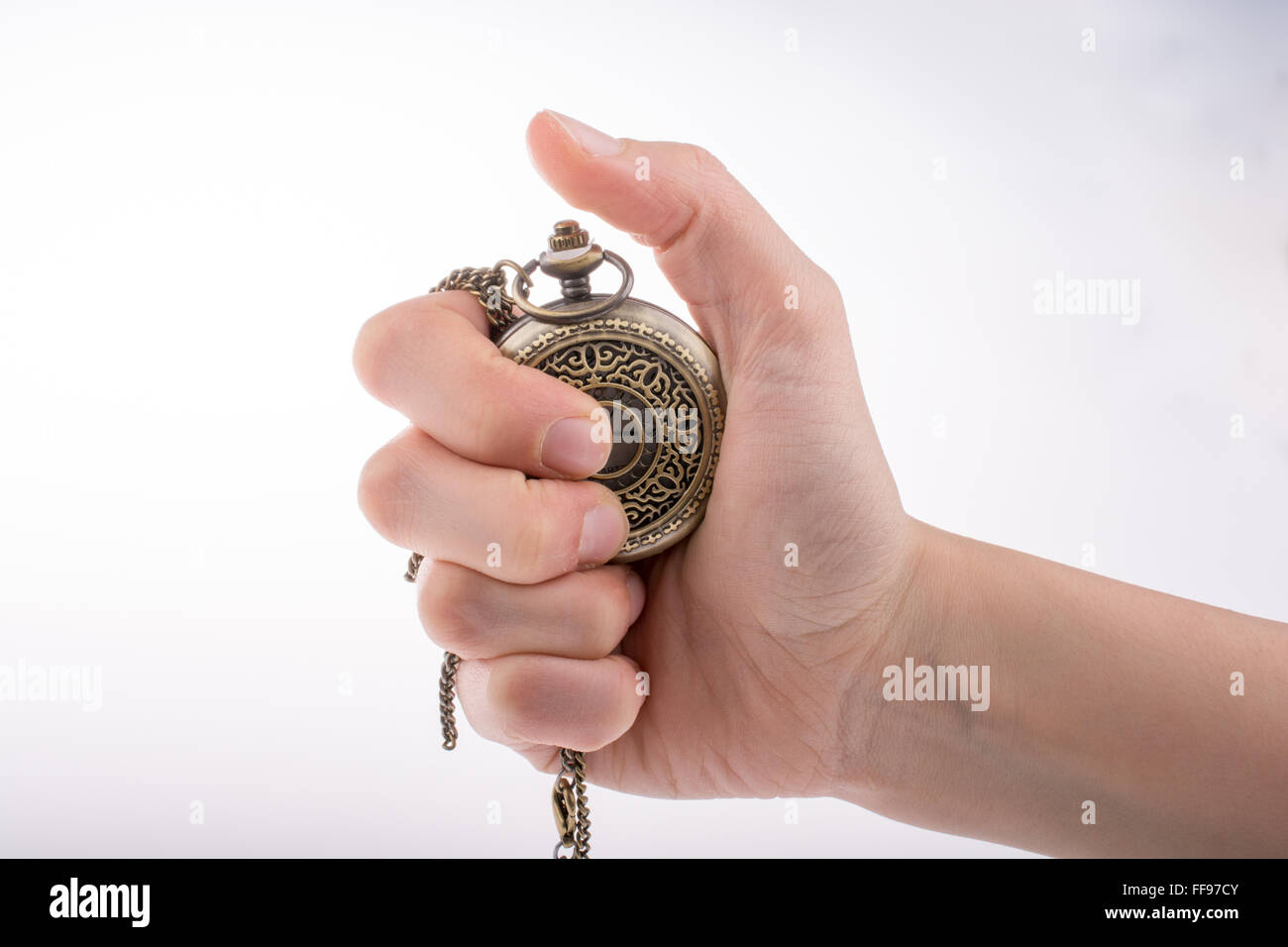 Hand holding a retro styled pocket watch in hand Stock Photo - Alamy