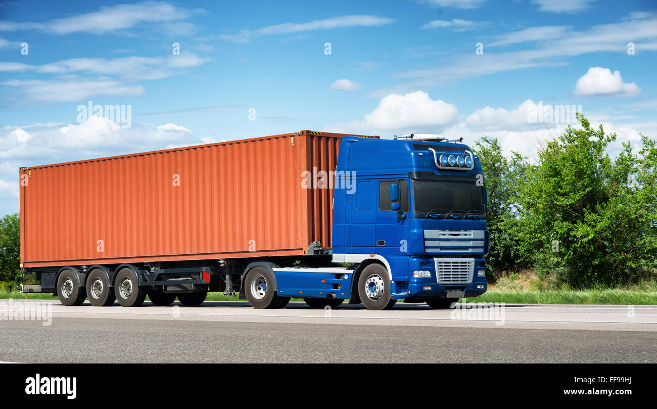 cargo truck with container on road, transportation concept Stock Photo ...