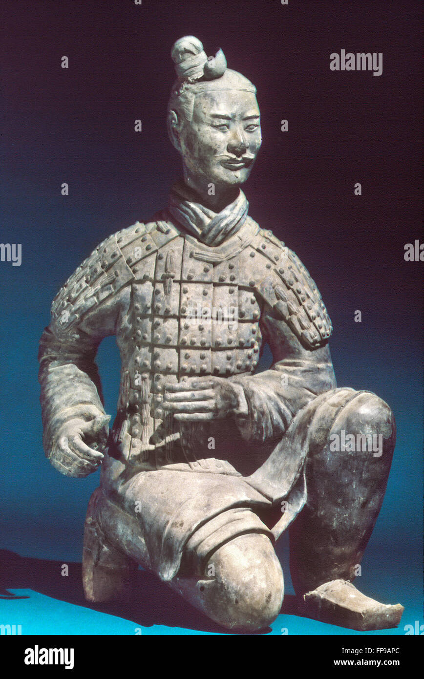CHINA: SOLDIER, c210 B.C. /nTerracotta sculpture of a kneeling archer ...