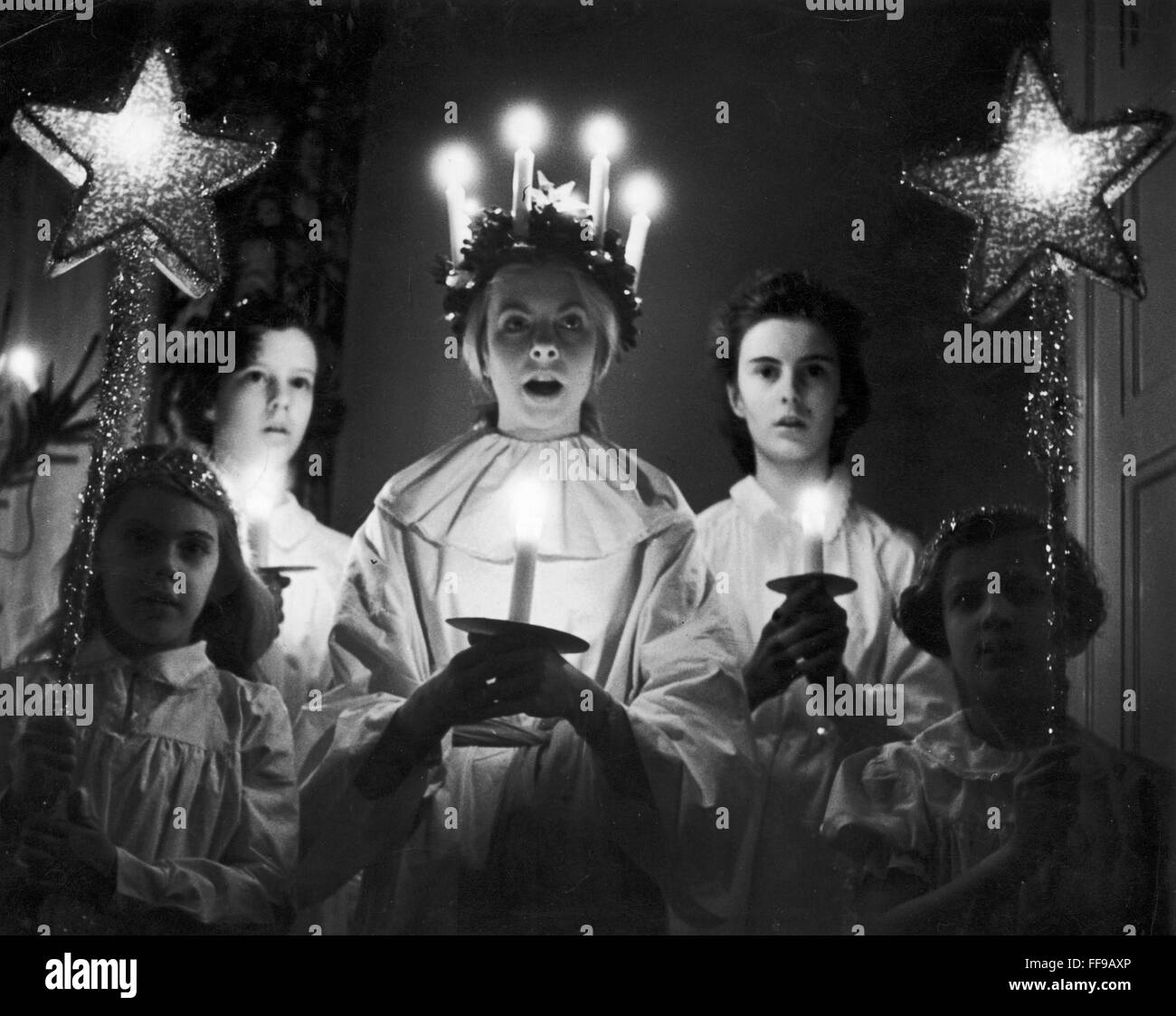 ST. LUCIA DAY. /nChoir of Swedish girls singing carols on St. Lucia Day ...