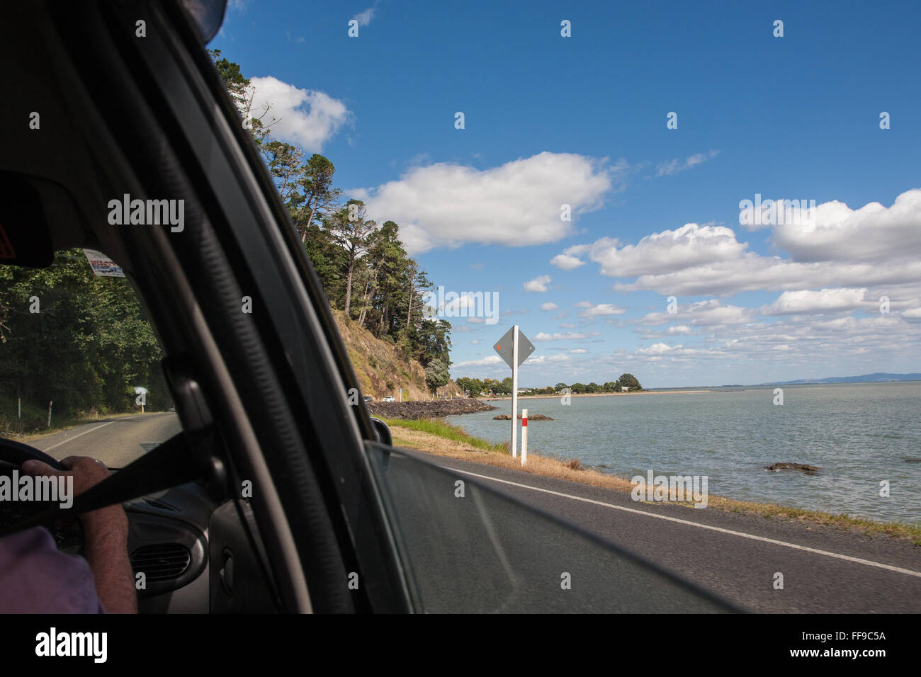 Driving along Highway 25 heading towards Thames on coastal road on ...