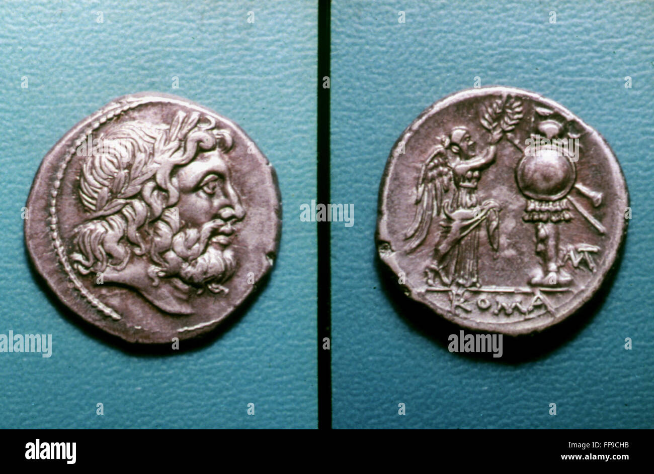 ROMAN COIN , 211-208 B.C. /nRoman silver victoriatus. /nObverse ...