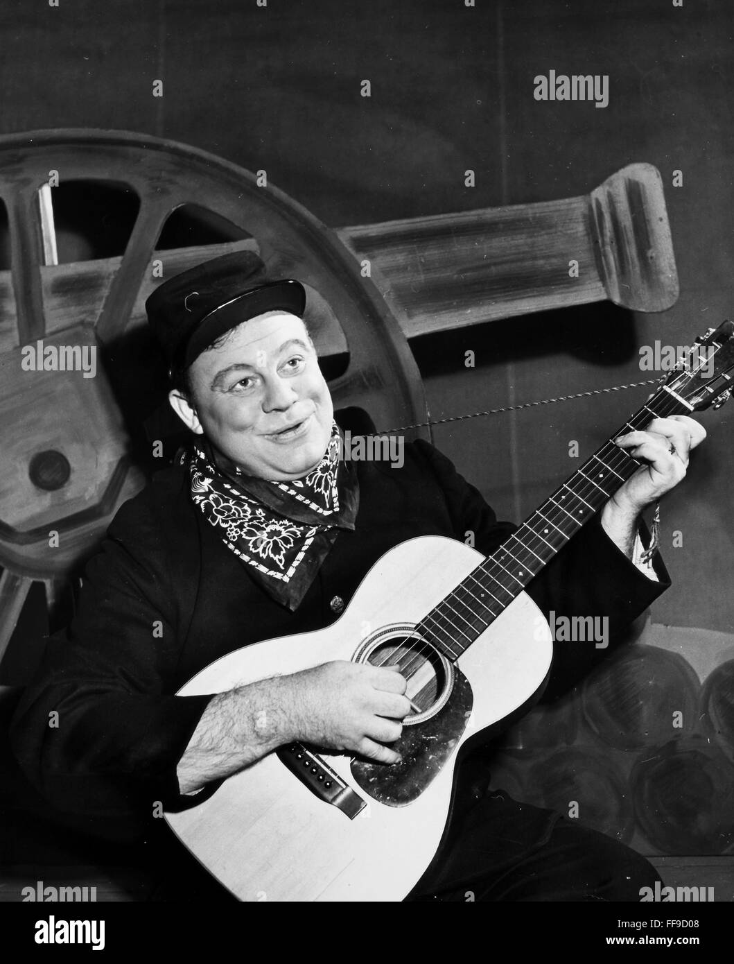 BURL IVES (1909-1995). /nAmerican actor and ballad singer. Ives singing ...