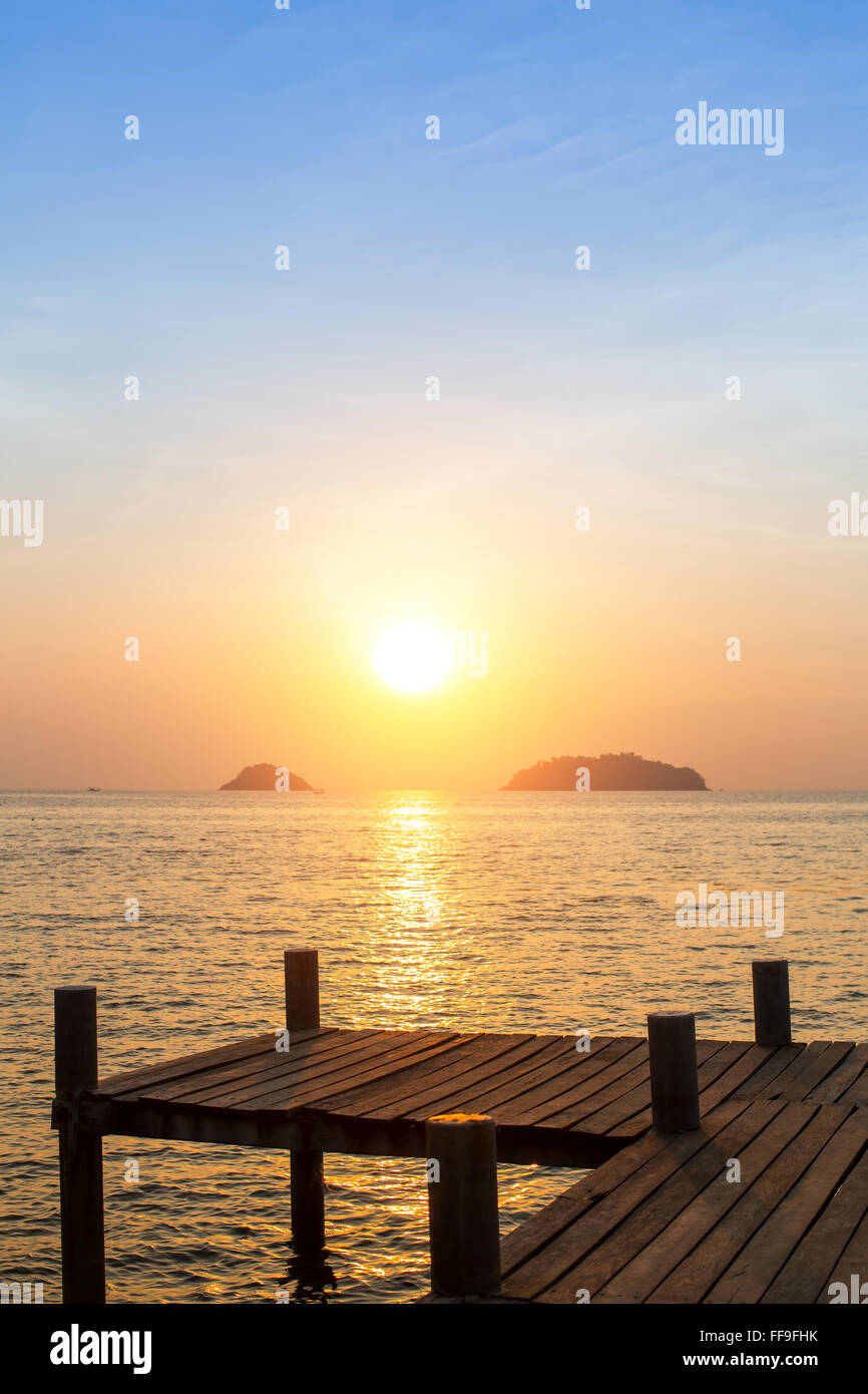 Wooden catwalk on the beach during sunset Stock Photo - Alamy