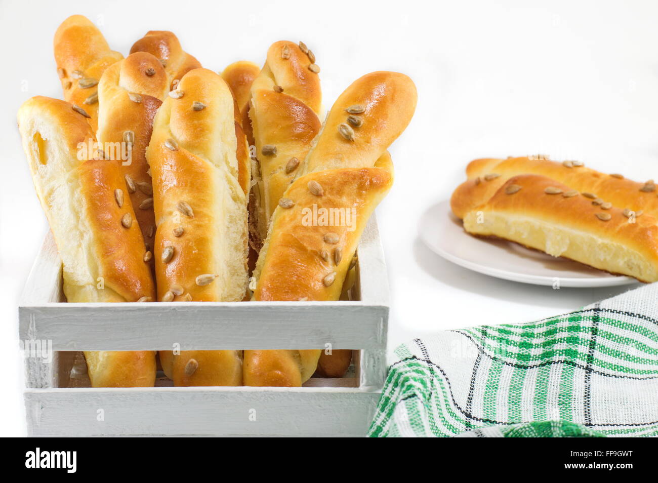 sesame pastry in a white crate Stock Photo - Alamy