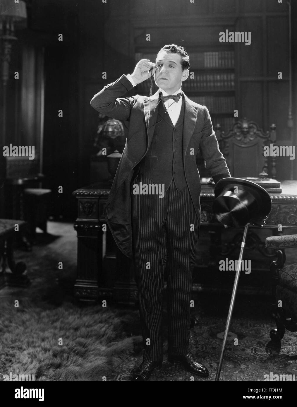 FILM STILL: GUY BATES. /nGuy Bates Post in 'The Good Boy.' Stock Photo ...