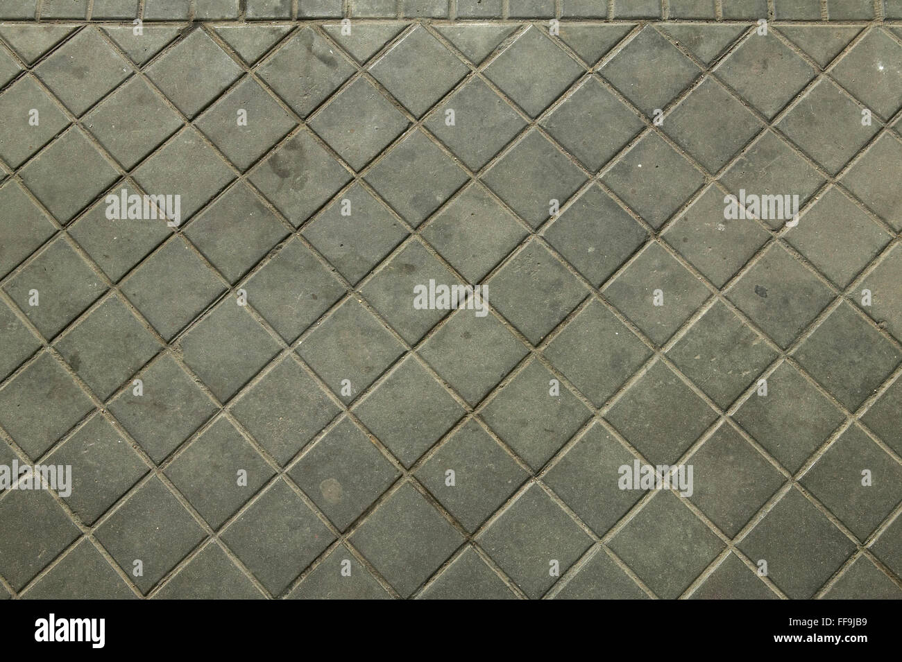 Square structure on a concrete pavement. Horizontal Stock Photo - Alamy
