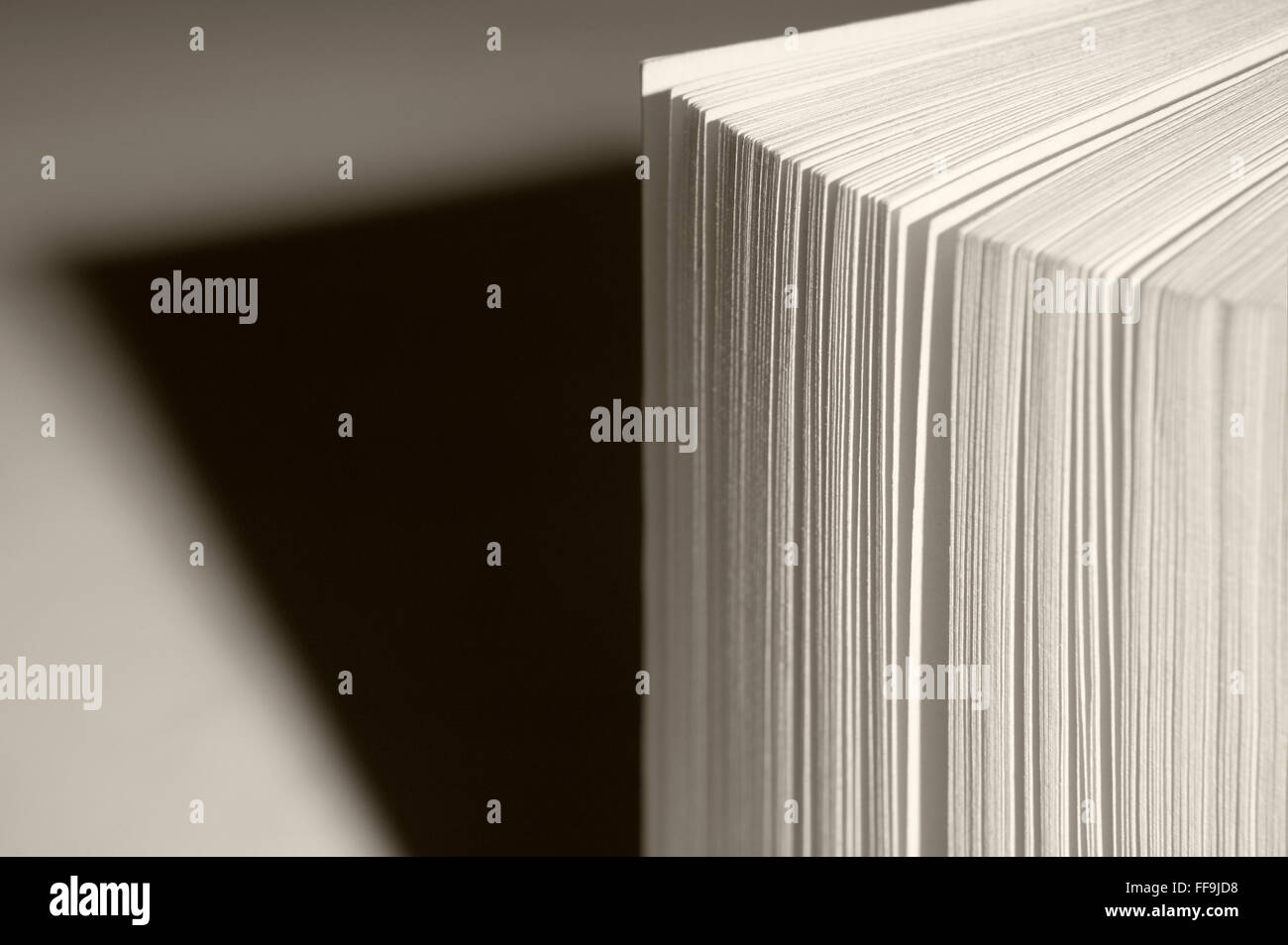 Book pages detail with shadow in sepia tone. Horizontal Stock Photo - Alamy