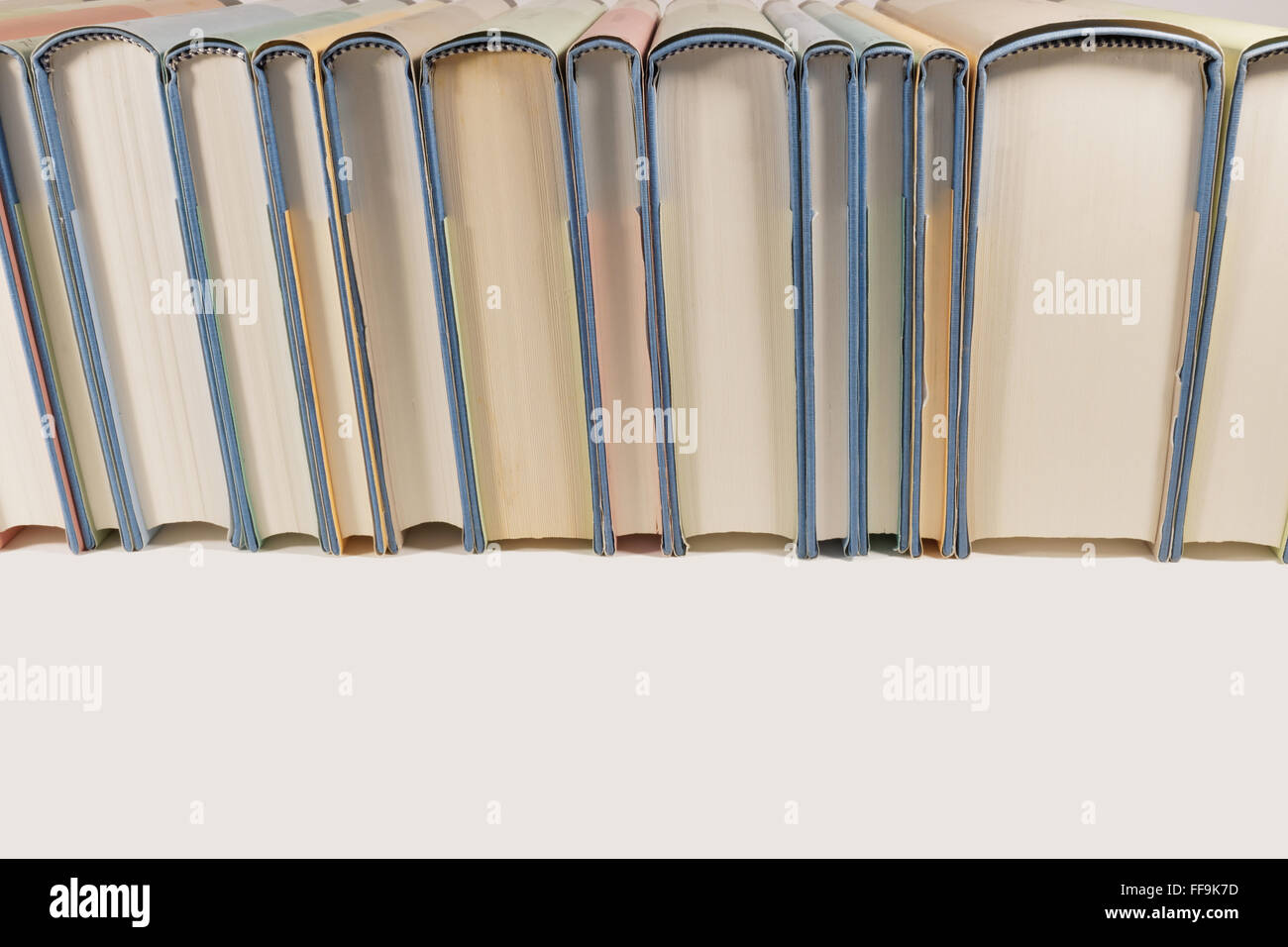 Stack of books isolated on white background, horizontal Stock Photo - Alamy