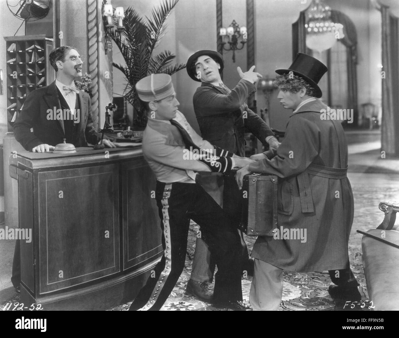 MARX BROTHERS, 1929./nin 'Coconuts,' 1929. Groucho, behind the desk ...
