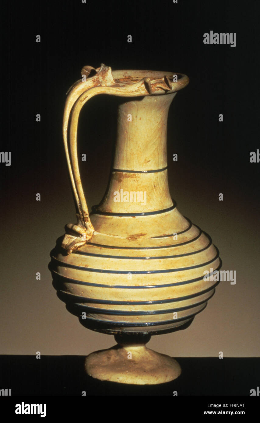 ROMAN GLASS PITCHER. /nRoman glass pitcher with trailed decoration. 1st ...