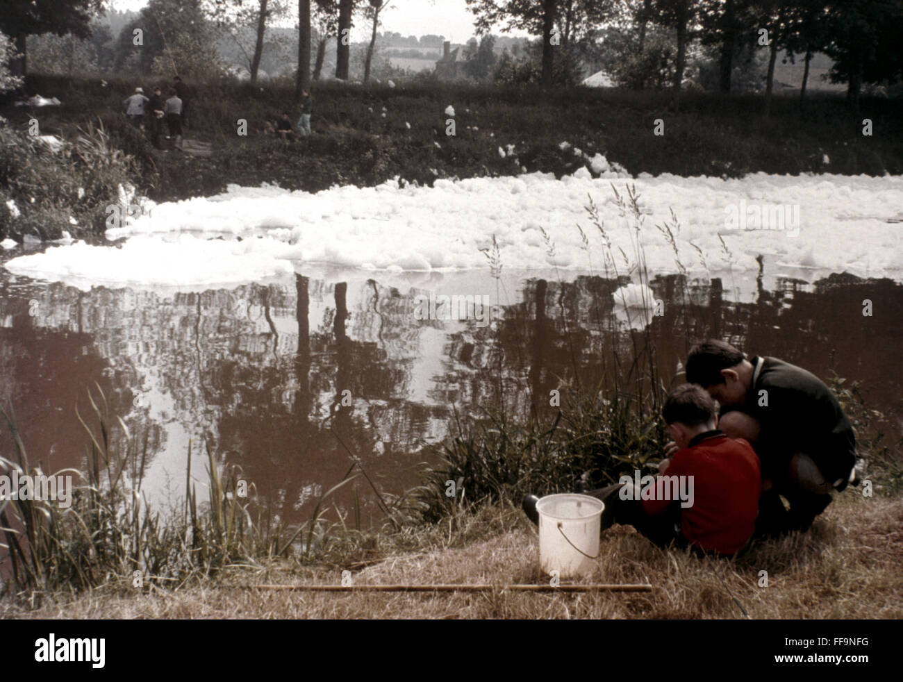 WATER POLLUTION. /nA stream covered by household or industrial ...