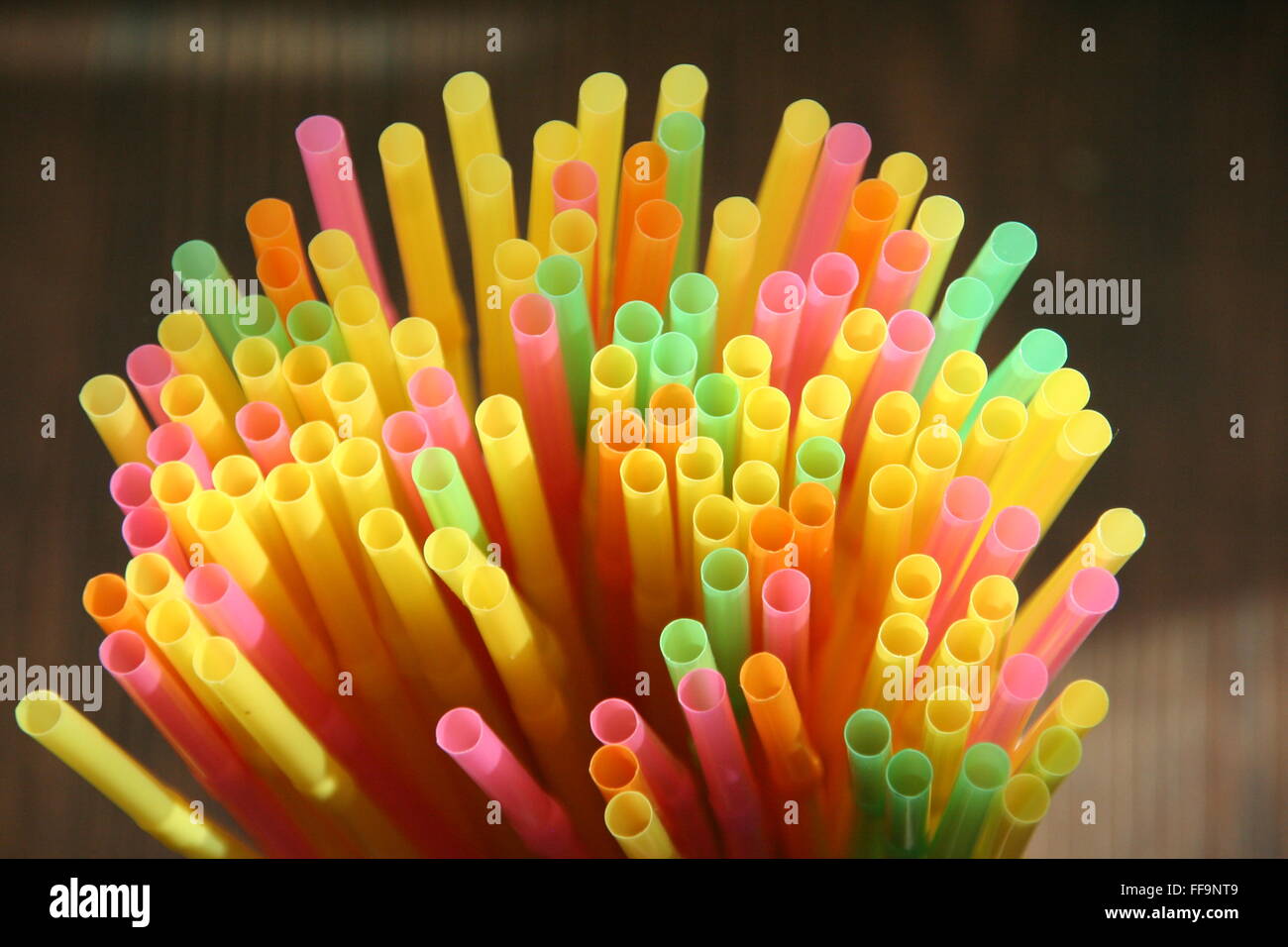 Multicolored plastic drinking straws Stock Photo - Alamy