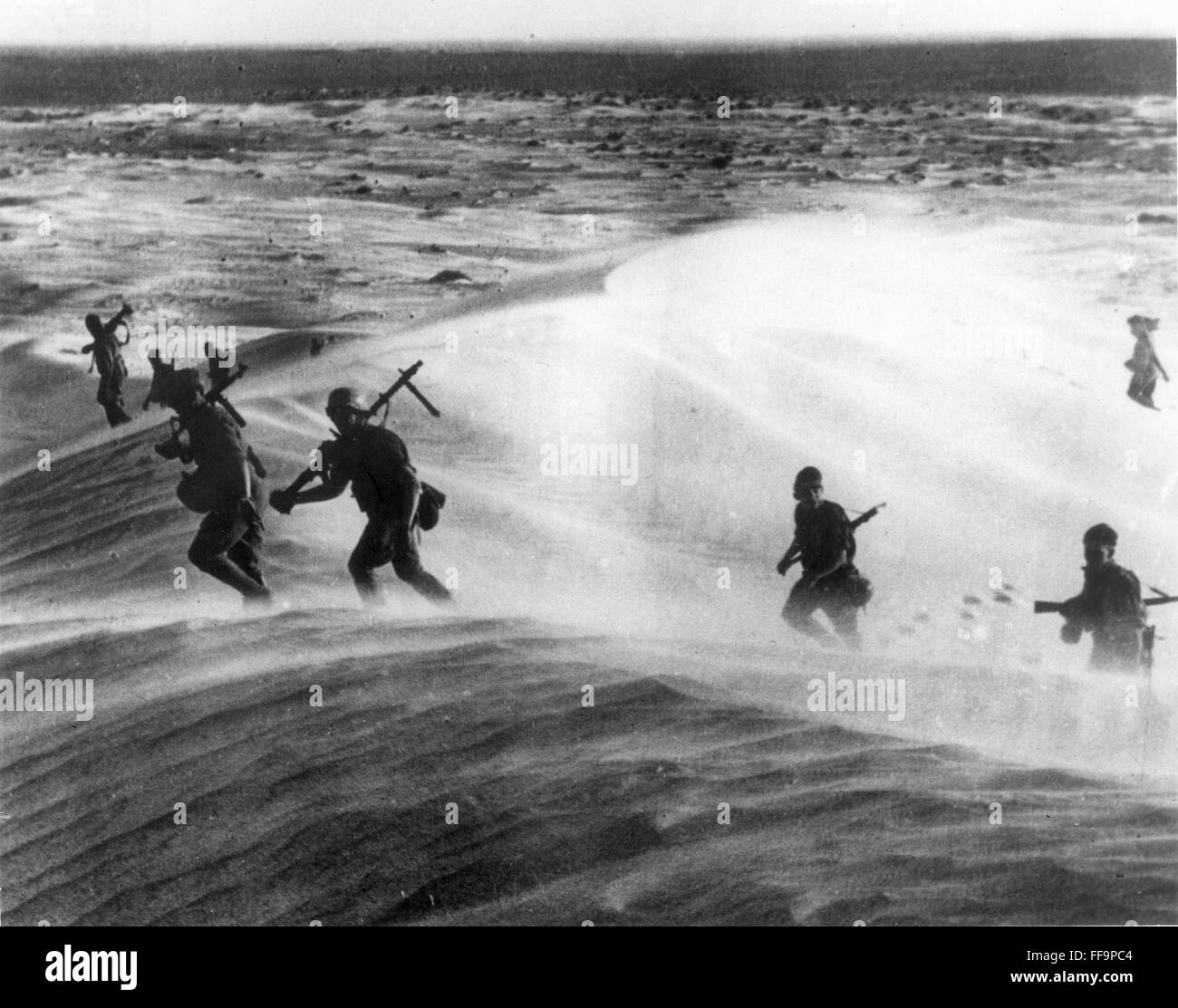 WORLD WAR II: LIBYA, 1941. /nGerman troops trudging through the desert ...