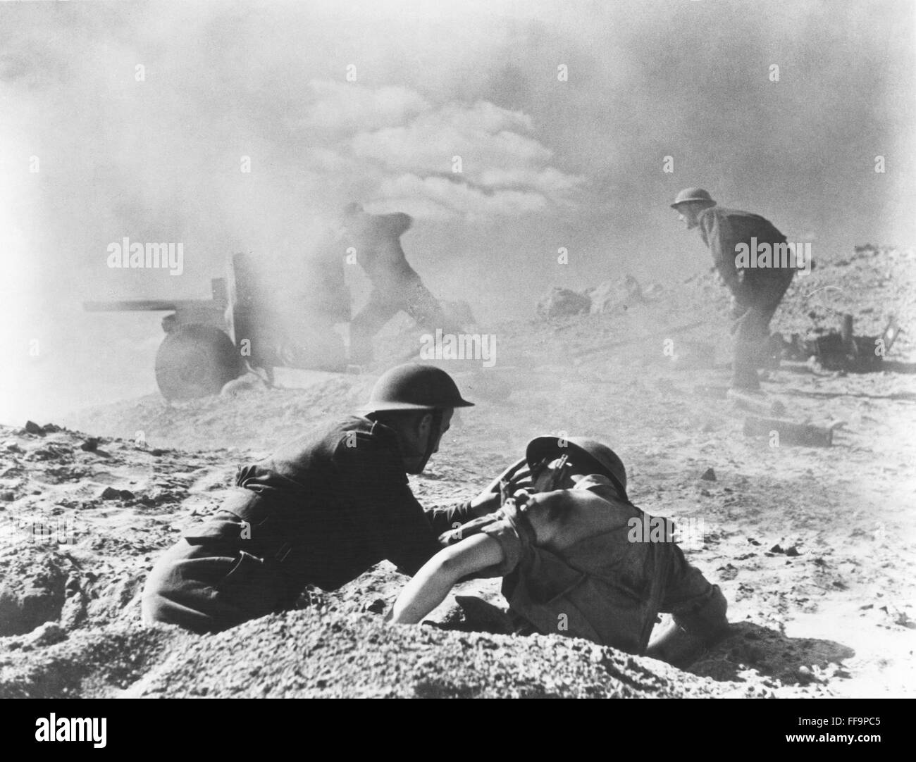WORLD WAR II: NORTH AFRICA. /nA British soldier aids a comrade while a ...
